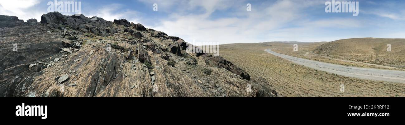 Panorama of wide top view from the rock of steppe landscape: road ...