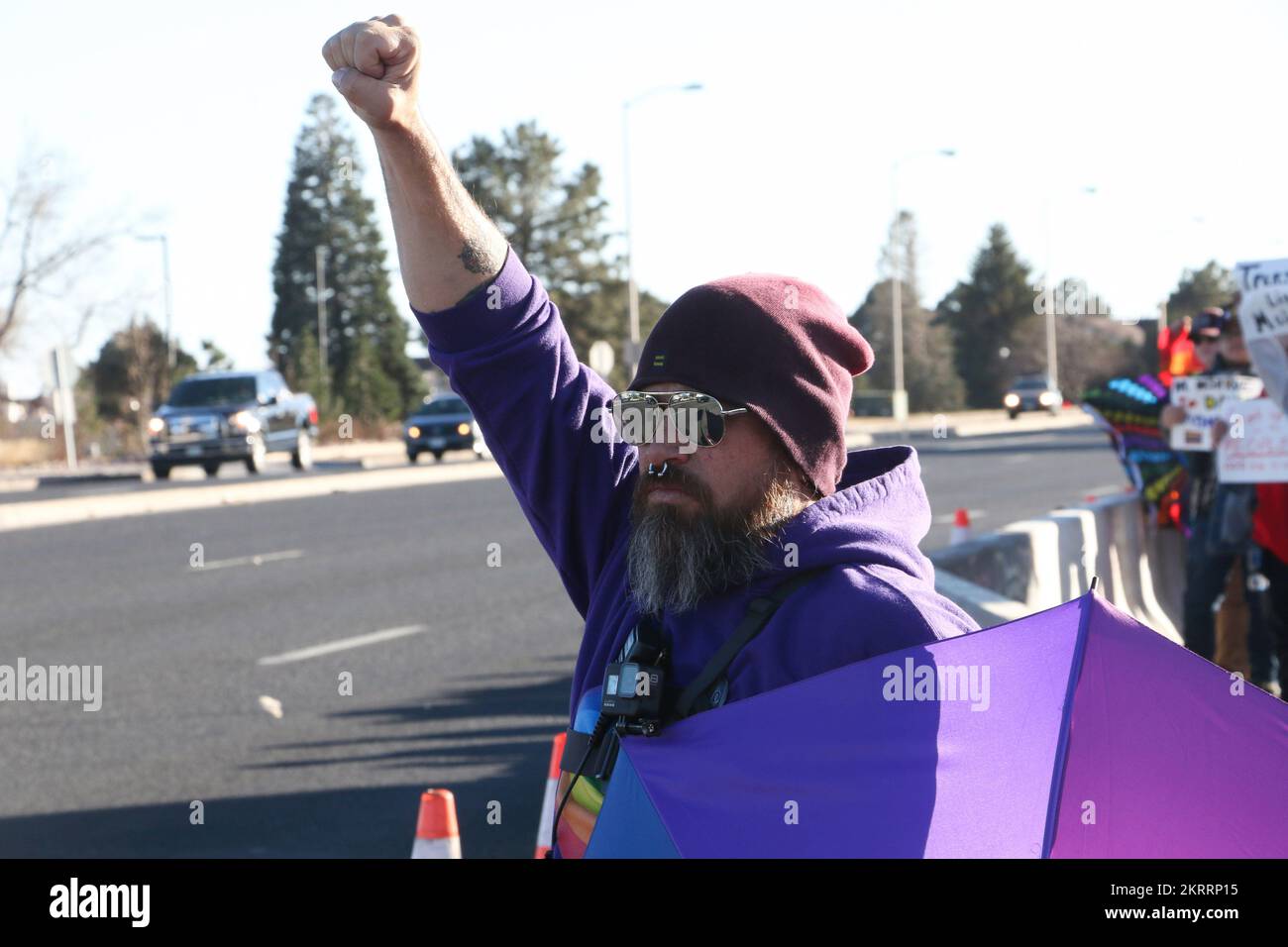 Colorado Springs, USA. 26th Nov, 2022. A man holds his fist in the air ...