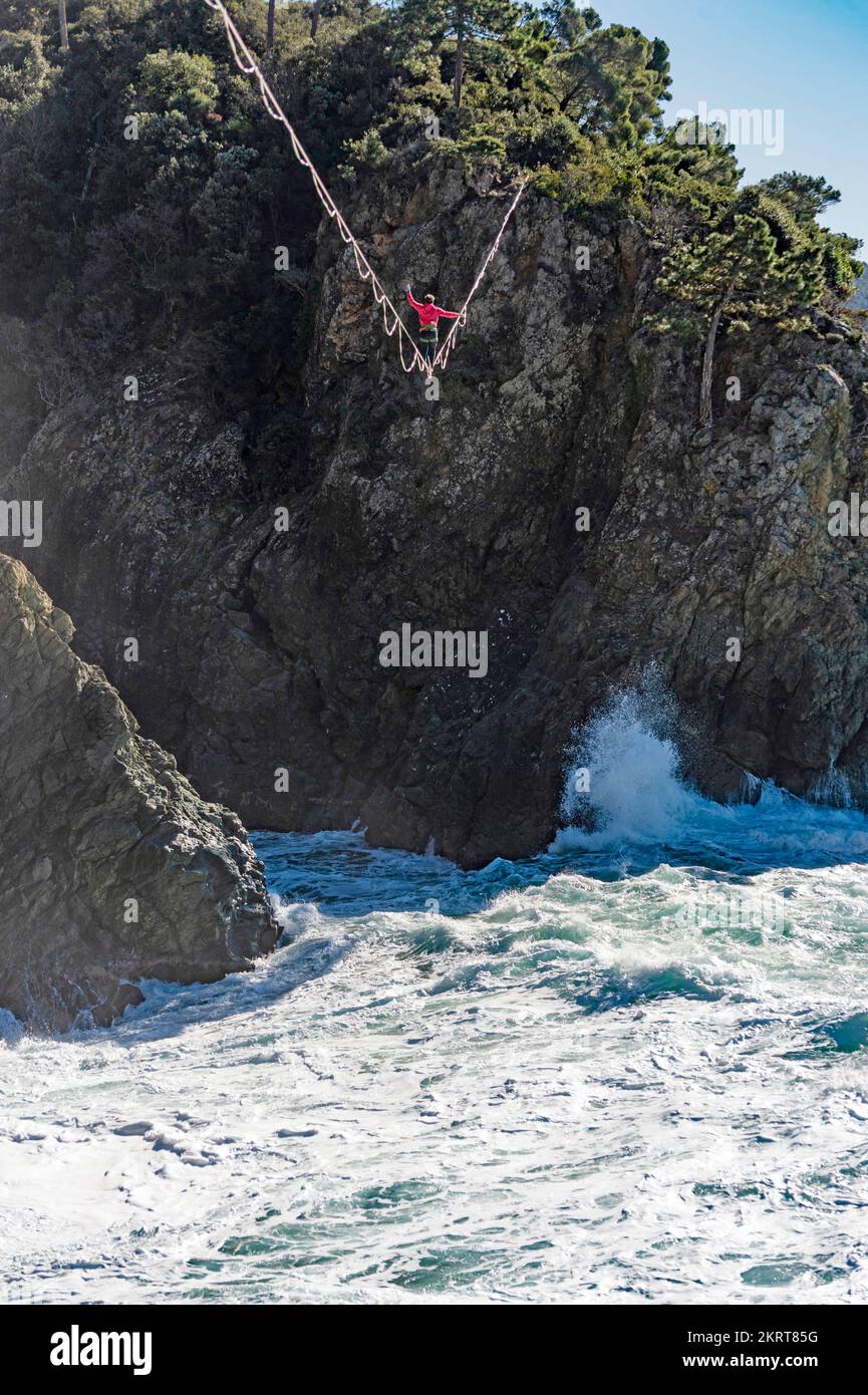 tightrope walker and sea, bonassola, italy Stock Photo - Alamy