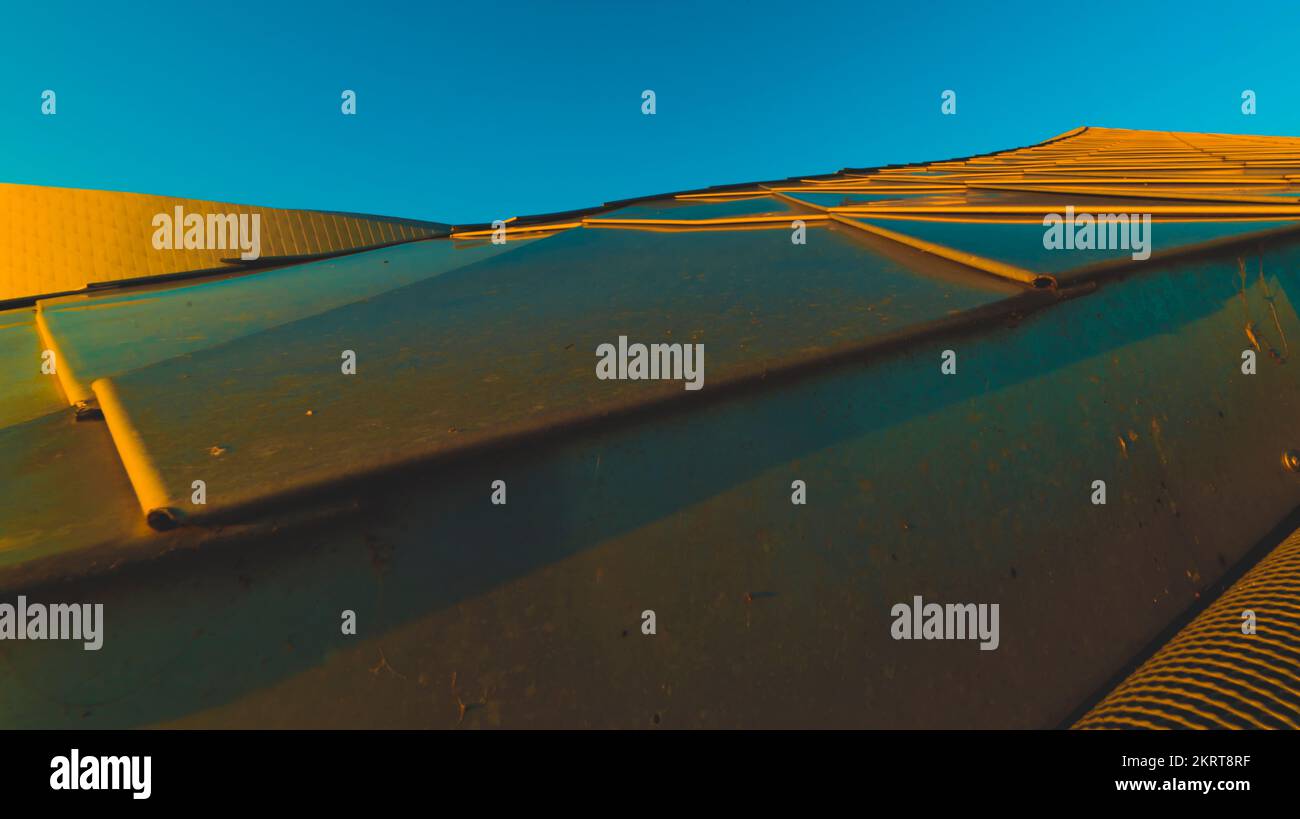 yellow metal part of the roof Stock Photo - Alamy