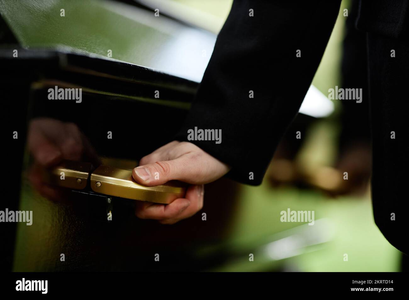 Funeral flower hand close up hi-res stock photography and images - Alamy