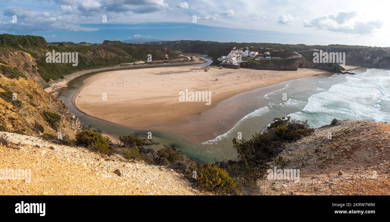 Panoramic view of Praia de Odeceixe Mar Surfer beach with golden sand ...
