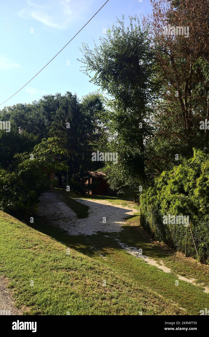 Descending access path to a house in the countryside Stock Photo - Alamy