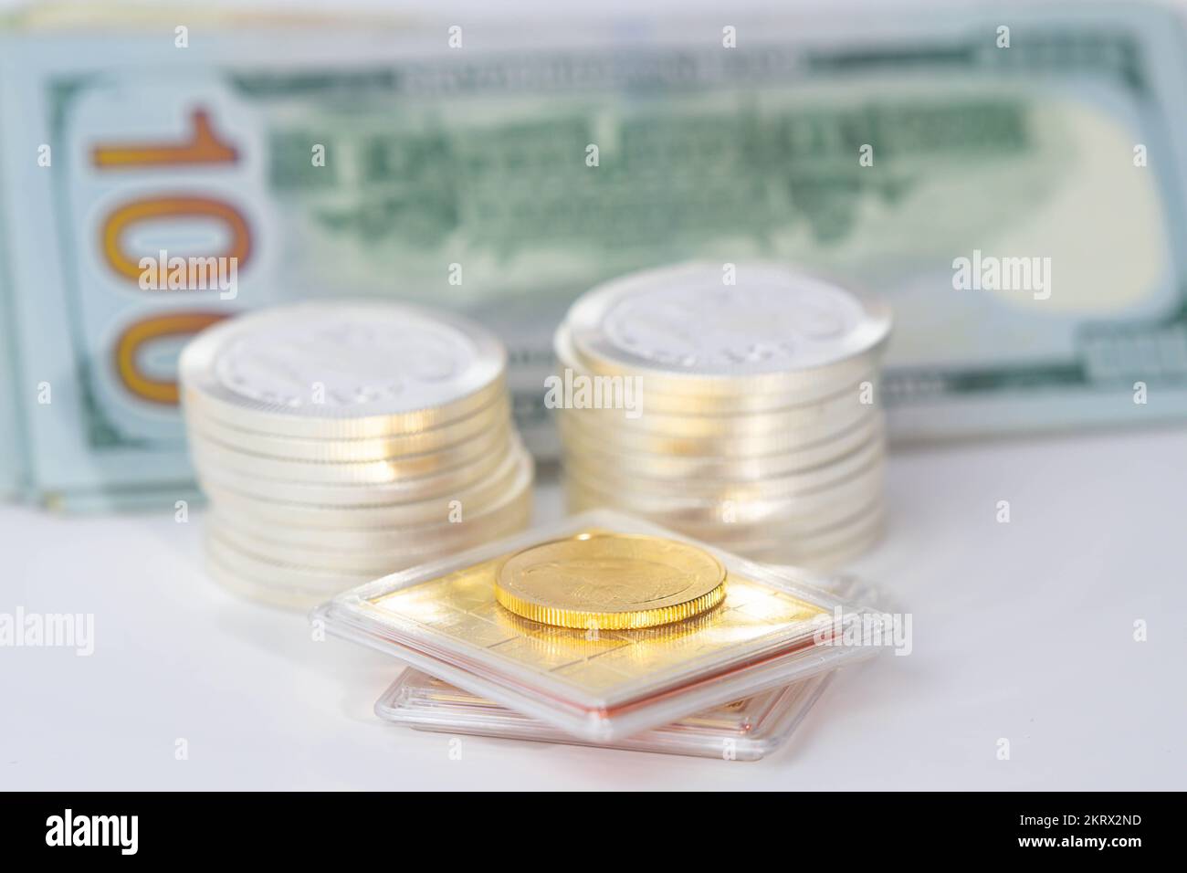 Home savings in gold silver and cash Stock Photo - Alamy