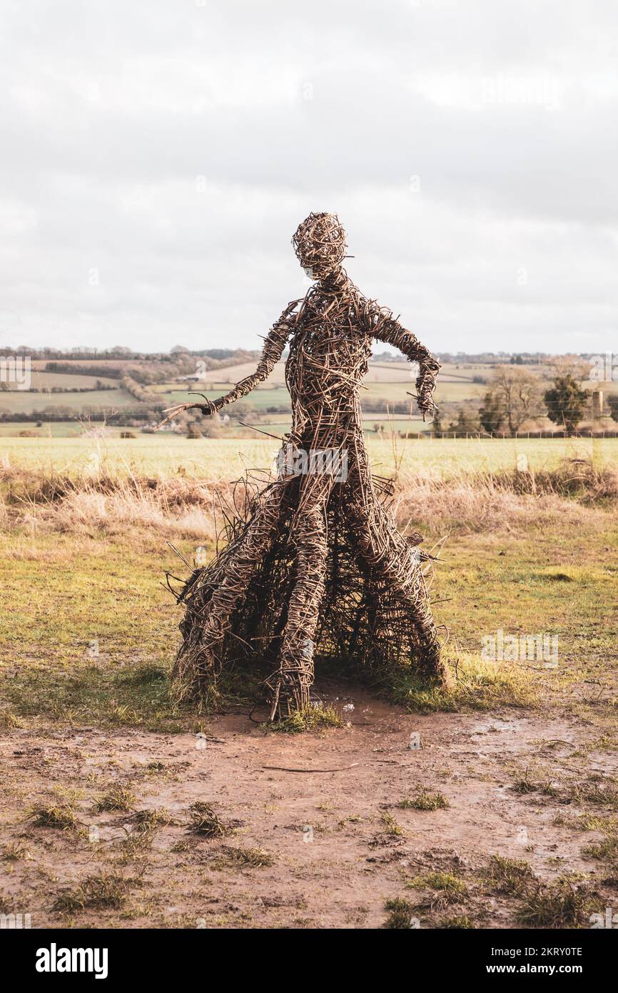 The wicker witch sculpture at the Rollright Stones in Oxfordshire on a ...