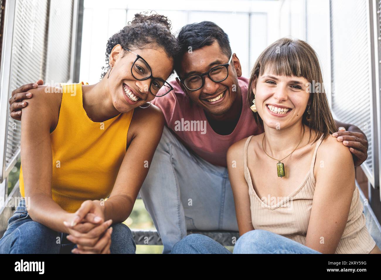 happy and smiling friends of generation z, portrait of one boy and two ...