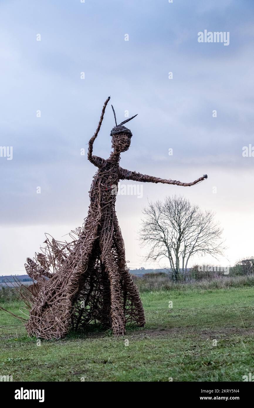The wicker witch sculpture at the Rollright Stones in Oxfordshire on a ...