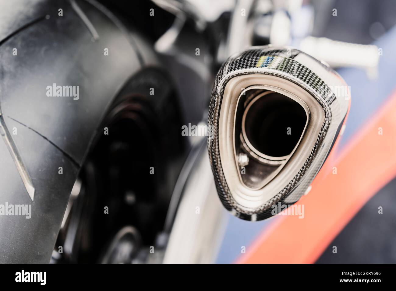 Close up shot of a motorcycle carbon exhaust pipe Stock Photo - Alamy