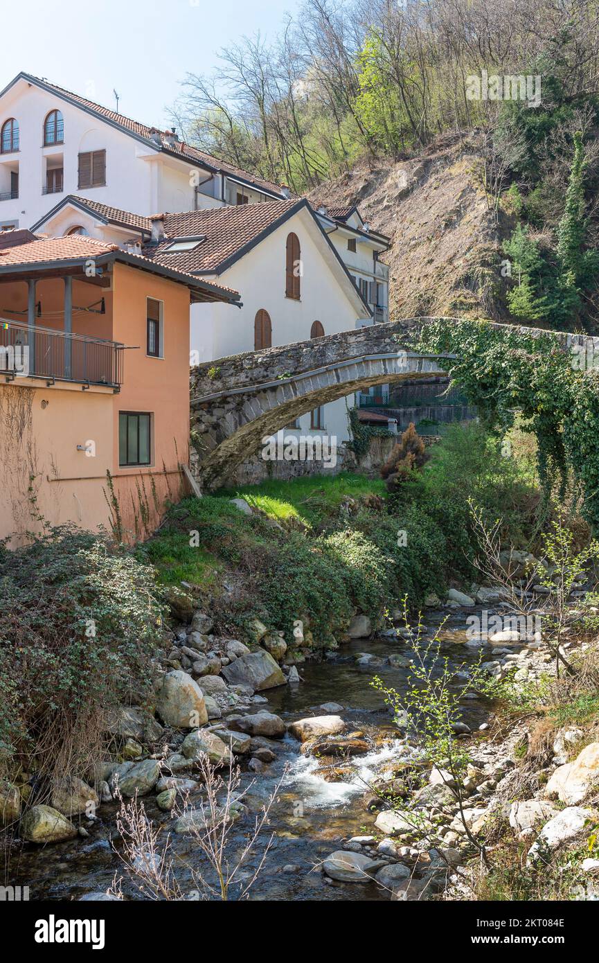 bridge over the pellino stream, pella, italy Stock Photo - Alamy