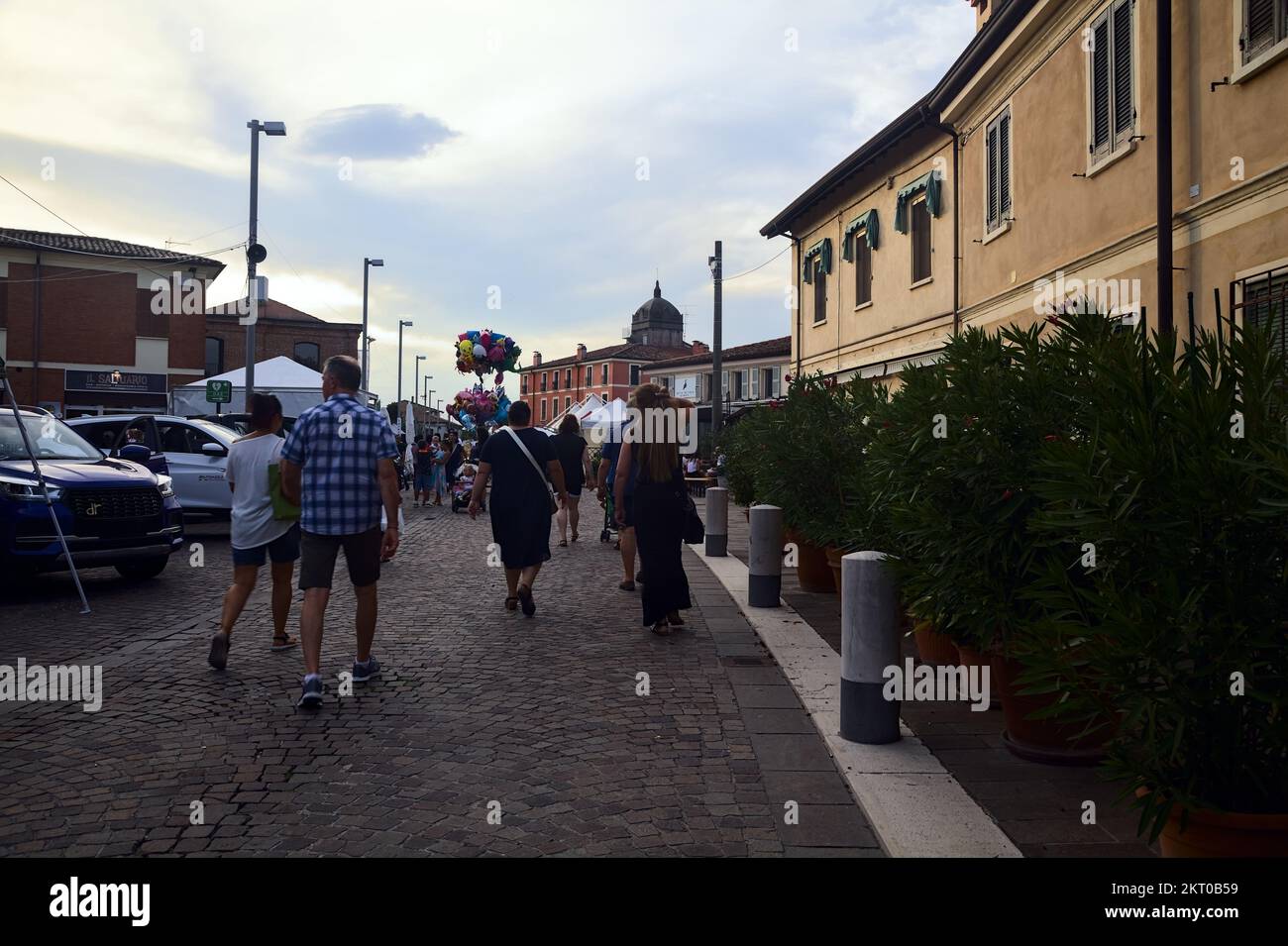 Stalls and crowd of a fair in the italian countryside in summer Stock ...