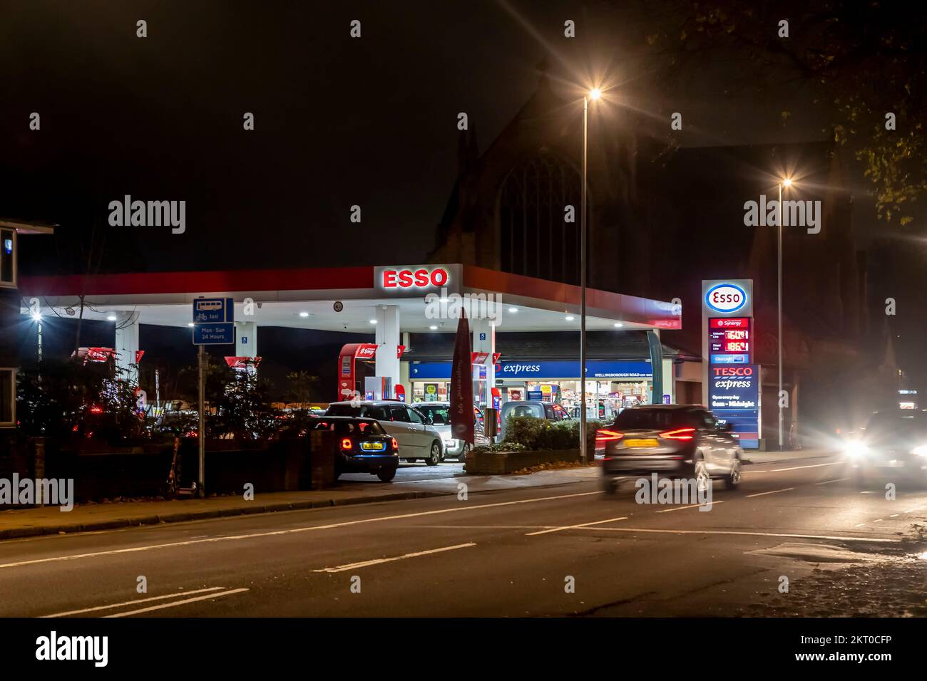 Busy ESSO garge and Tesco's, Wellingborough road, Northampton, England ...