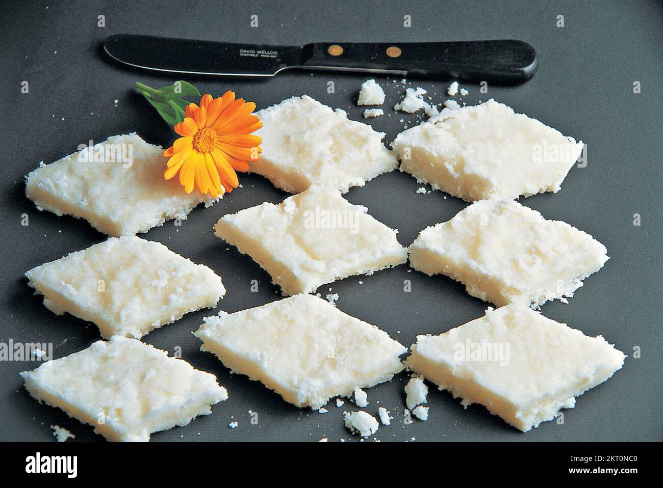 Pieces of Diamond shaped coconut ice Stock Photo - Alamy