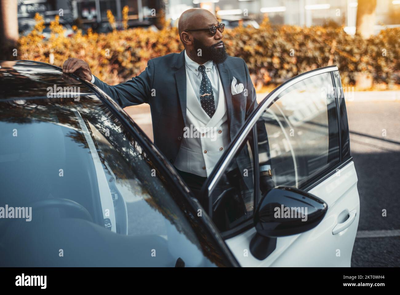 View of a handsome bald black man entrepreneur with a fine black beard ...