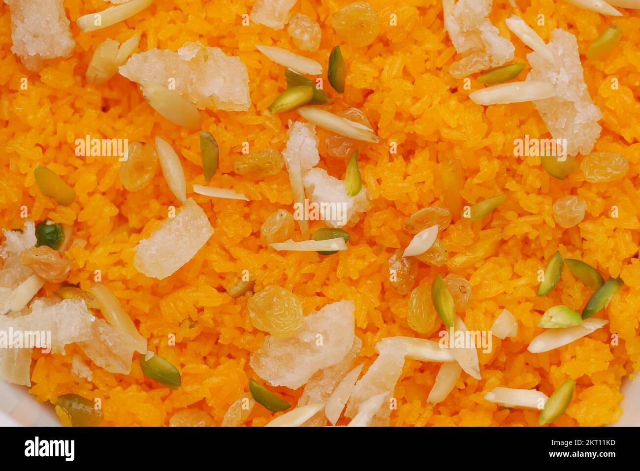 A big white bowl filled with tasty Jollof Rice served Stock Photo - Alamy