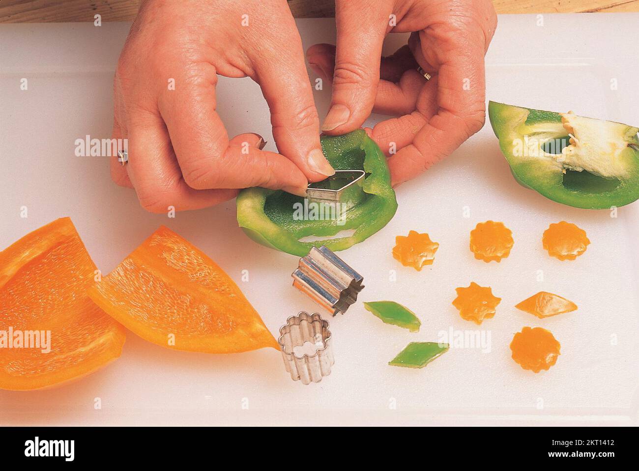 Cutting out vegetable shapes with biscuit cutter Stock Photo - Alamy