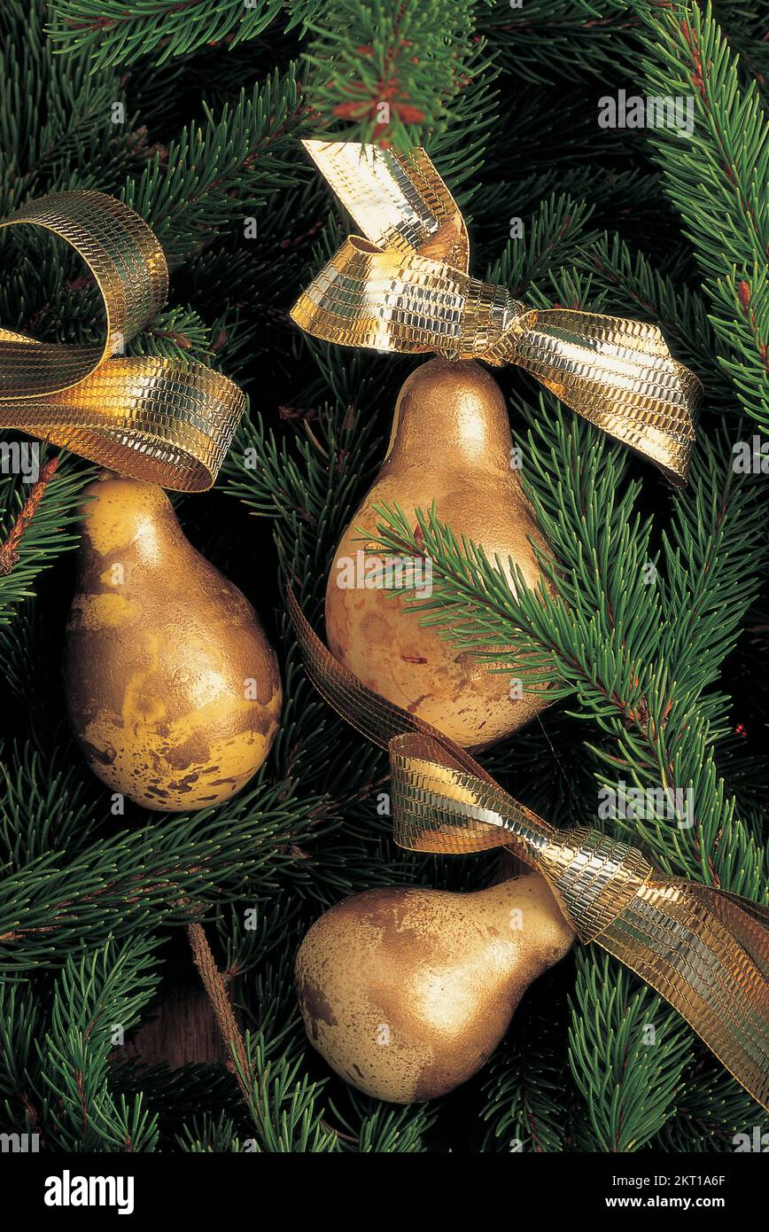 Christmas tree decorated with gold pears Stock Photo - Alamy