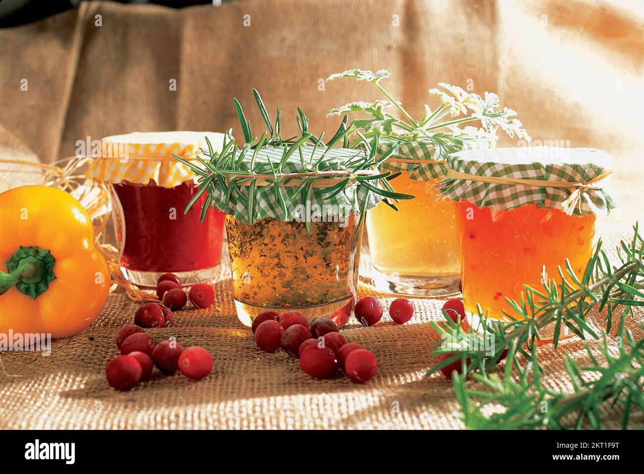 A selection of Assorted preserves in tumblers Stock Photo - Alamy
