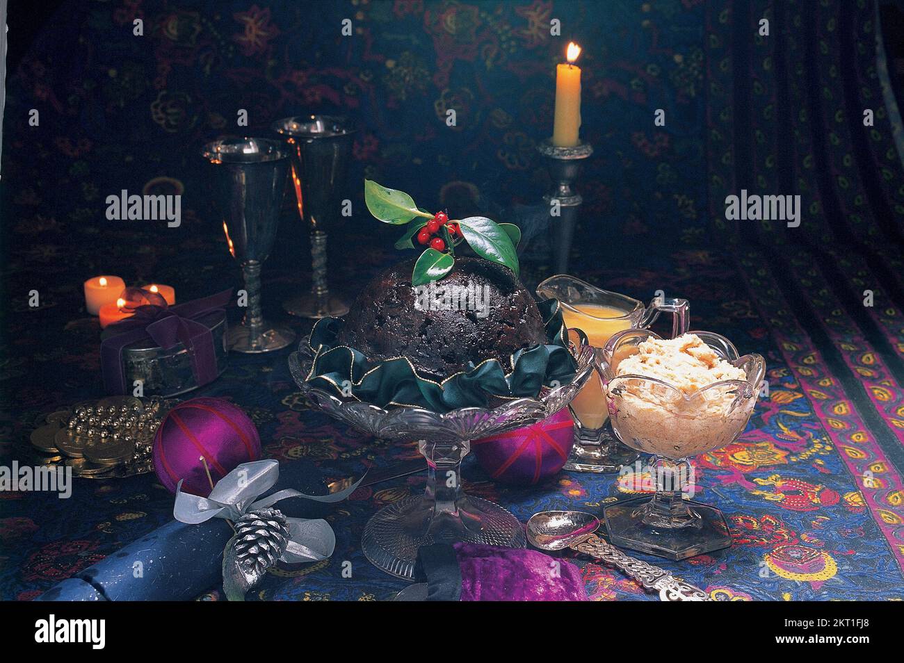 Christmas Pudding on a glass cake stand Stock Photo - Alamy