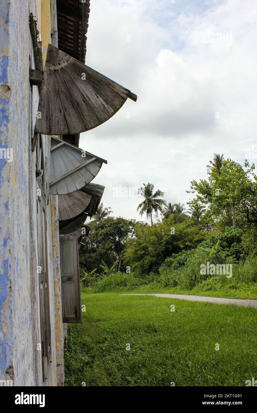 Ipoh, Perak, Malaysia - November 2012: Wooden window awnings of a ...