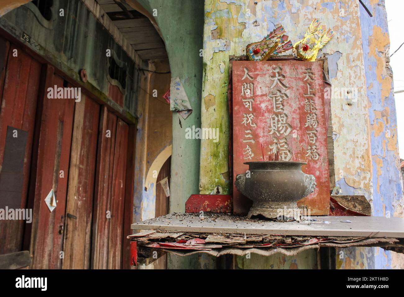 Ipoh, Perak, Malaysia - November 2012: A roadside Buddhist shrine with ...