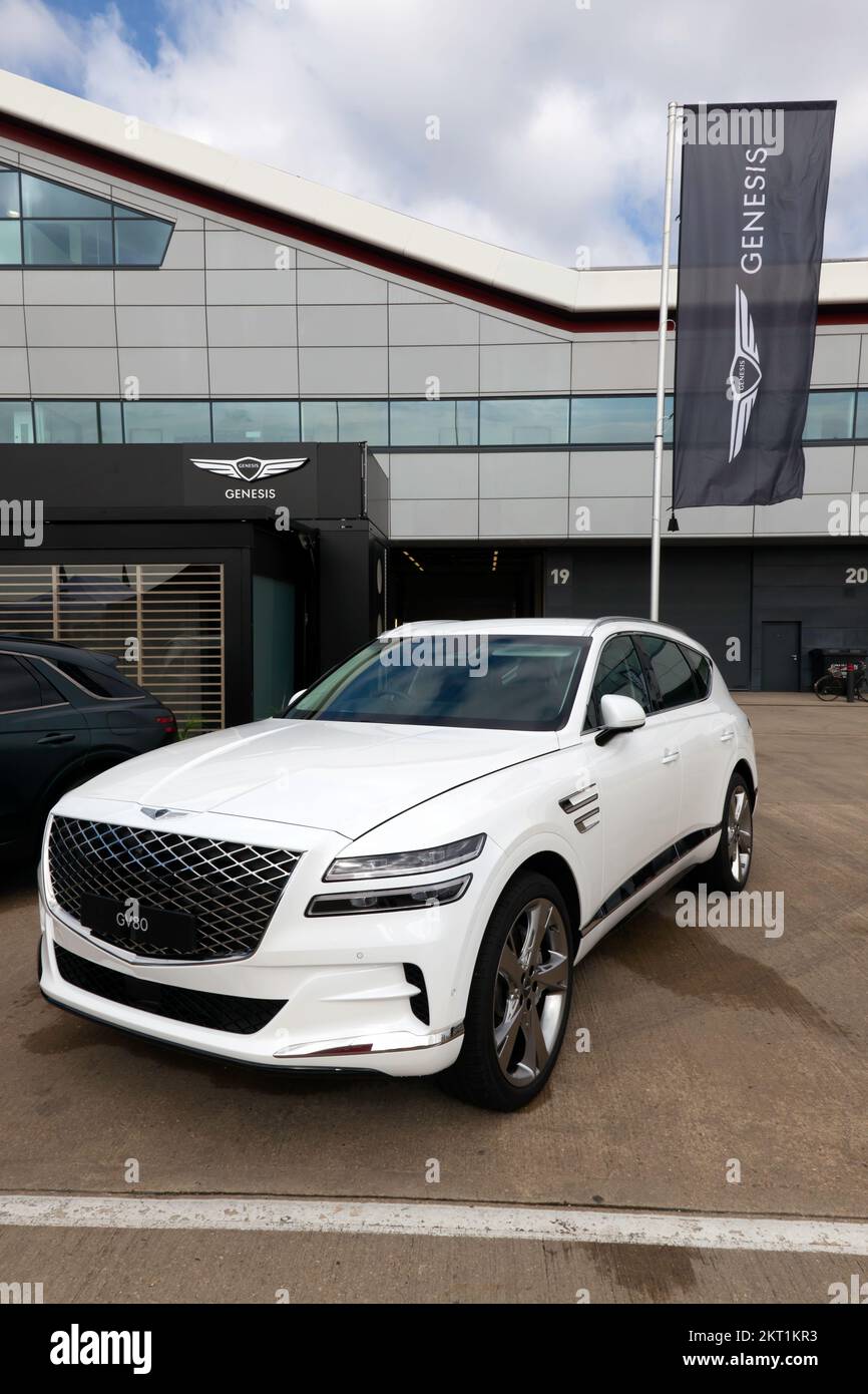 Three-quarter front view of a White, Genesis GV80, on display at the ...