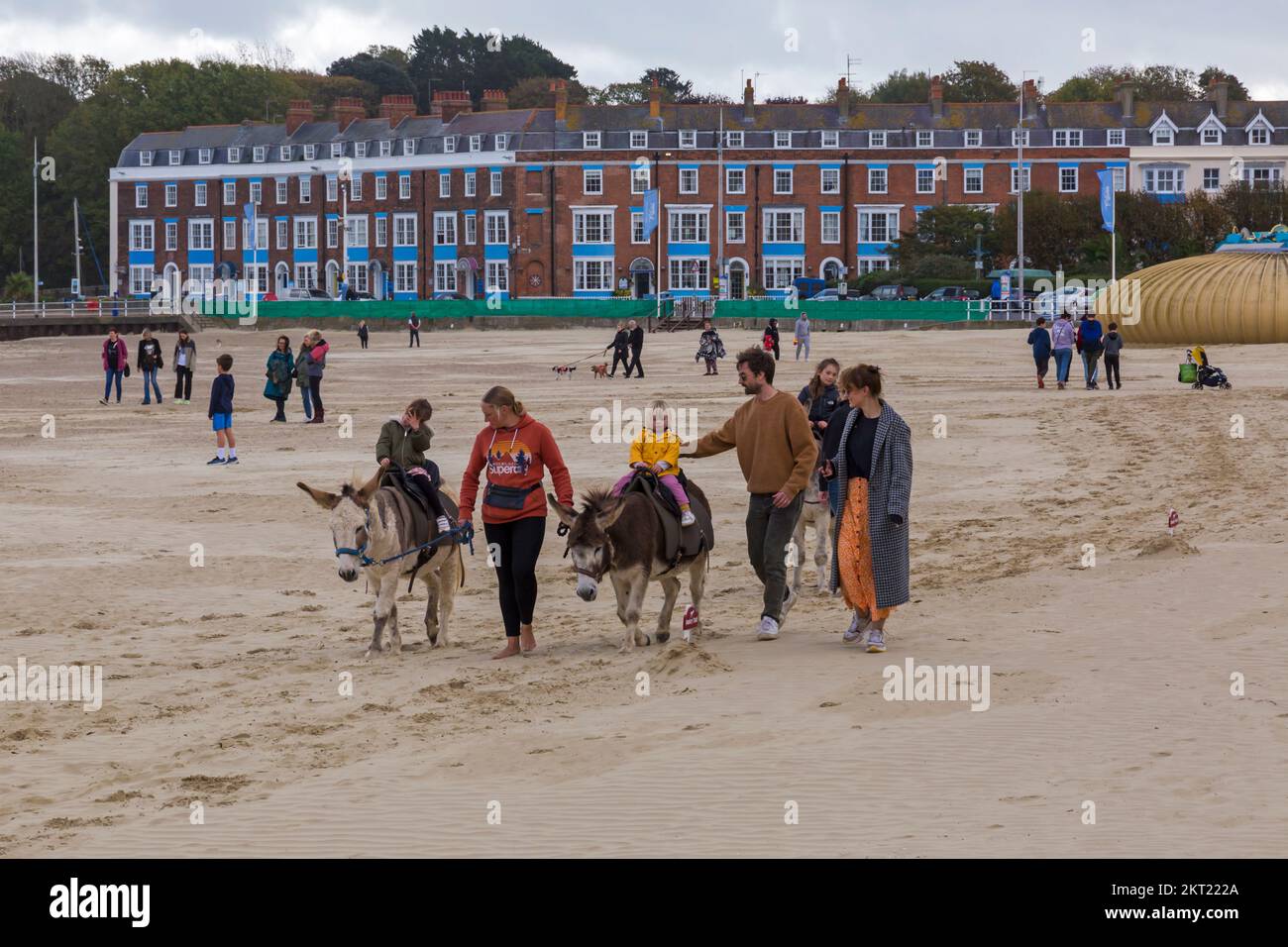 Two women ride donkey in hi-res stock photography and images - Alamy
