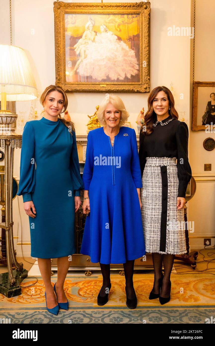 Queen Consort Camilla (center) holds an afternoon tea in honor of Queen ...