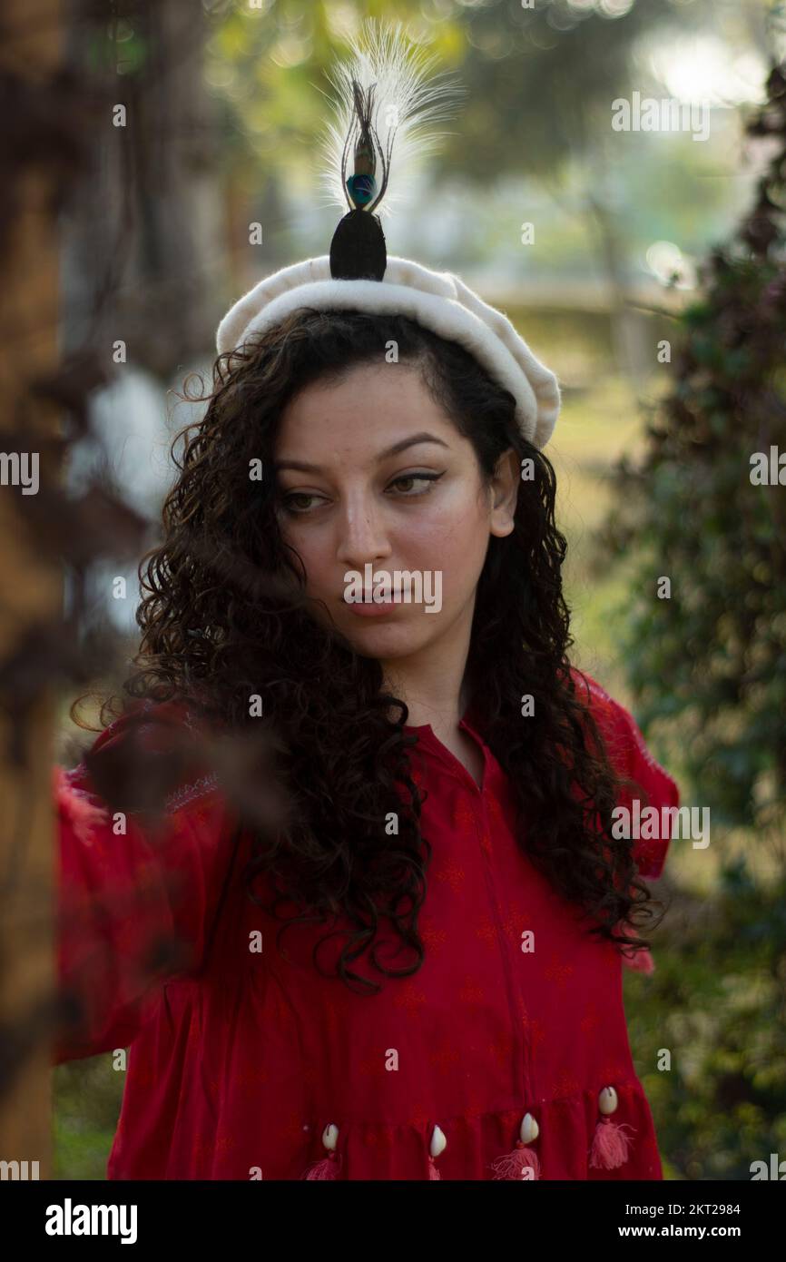 A girl wearing a Traditional cap, called Pakol Stock Photo - Alamy