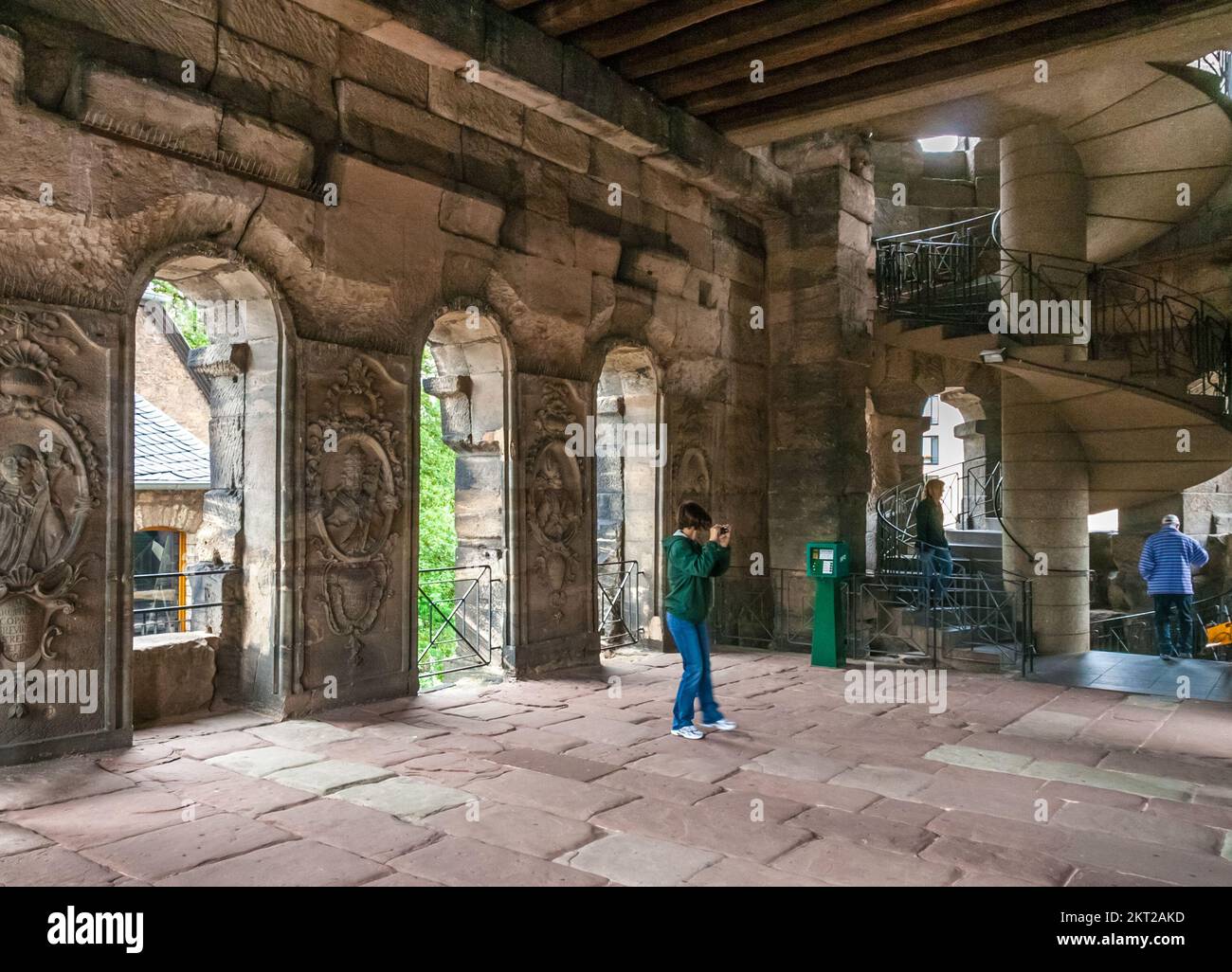 A visitor is taking pictures inside the famous Porta Nigra, a large ...