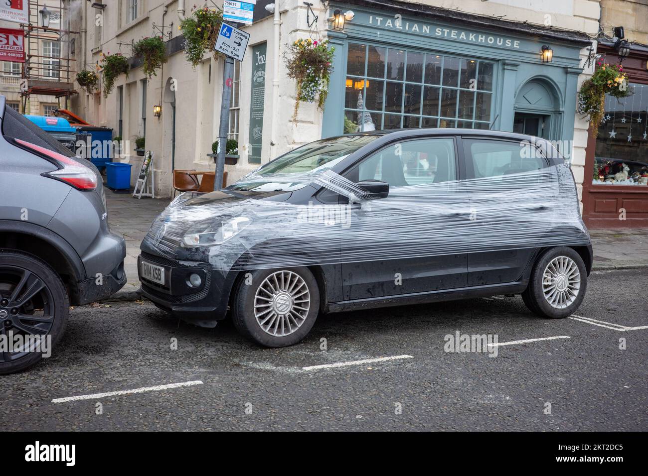 Car wrapped in cling film Stock Photo - Alamy