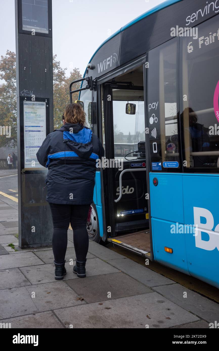 Female Bus Driver next to her bus Stock Photo - Alamy