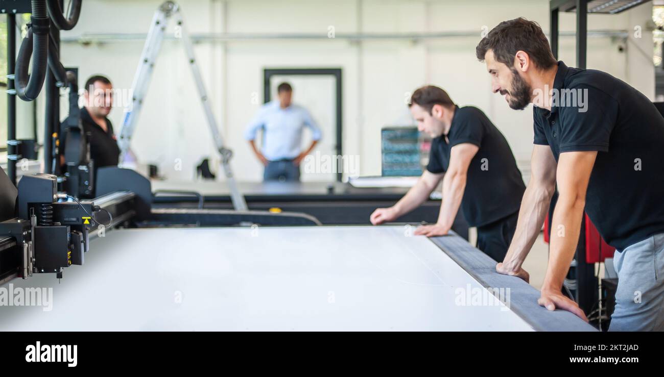 Professional workers graphic technicians operators work in a printing ... Professional workers graphic technicians operators work in a printing ...