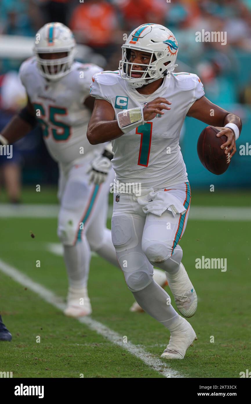 Miami. FL USA; Miami Dolphins quarterback Tua Tagovailoa (1) runs with ...