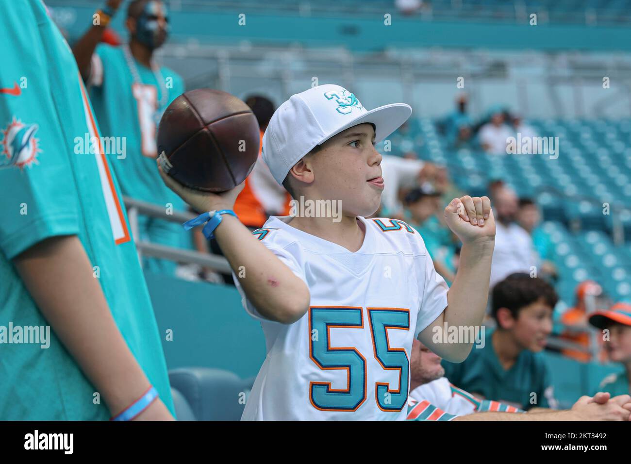 Miami. FL USA; A young fan plays catch with Miami Dolphins wide ...