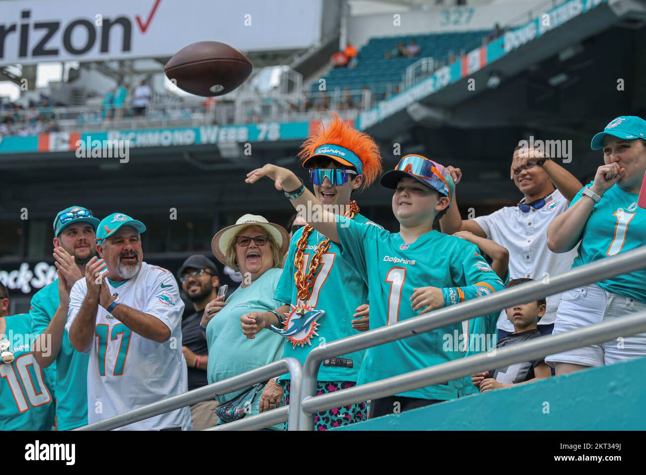 Miami. FL USA; A young fan plays catch with Miami Dolphins wide ...