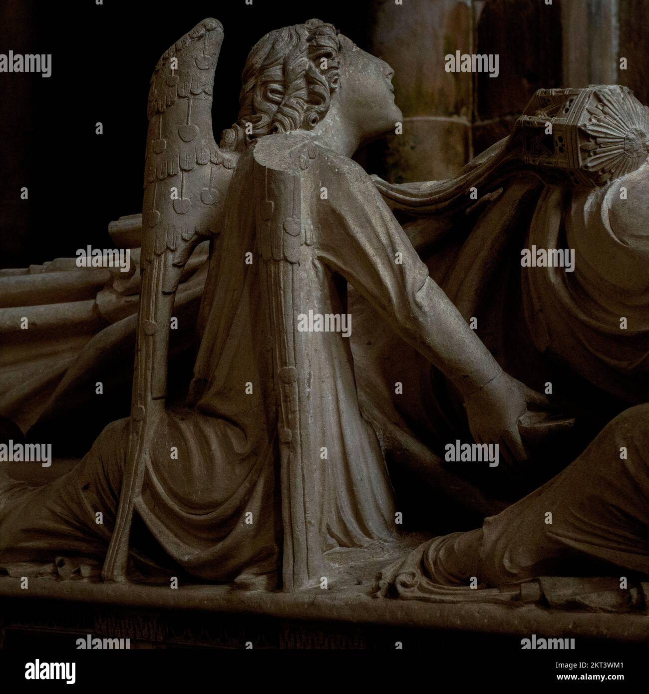 An angel with an incense censer and a broken wing gazes up to Heaven ...