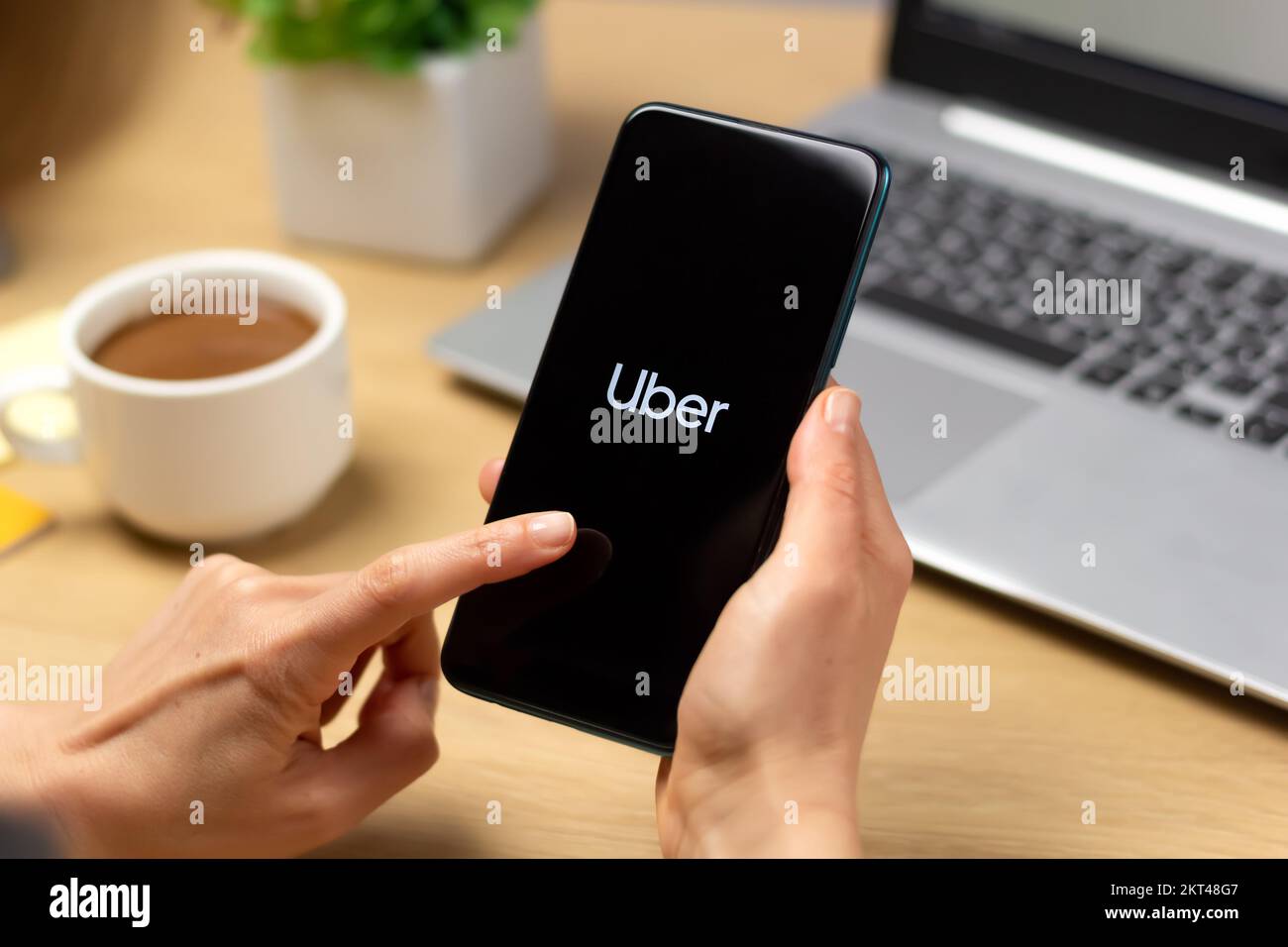 Kyiv, Ukraine - Oct. 15th, 2022: Uber logo on smartphone screen. Mobile ...