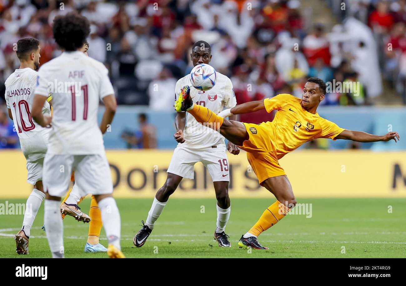 AL KHOR - Ali Almoez of Qatar and Jurrien Timber of Holland (LR) during ...