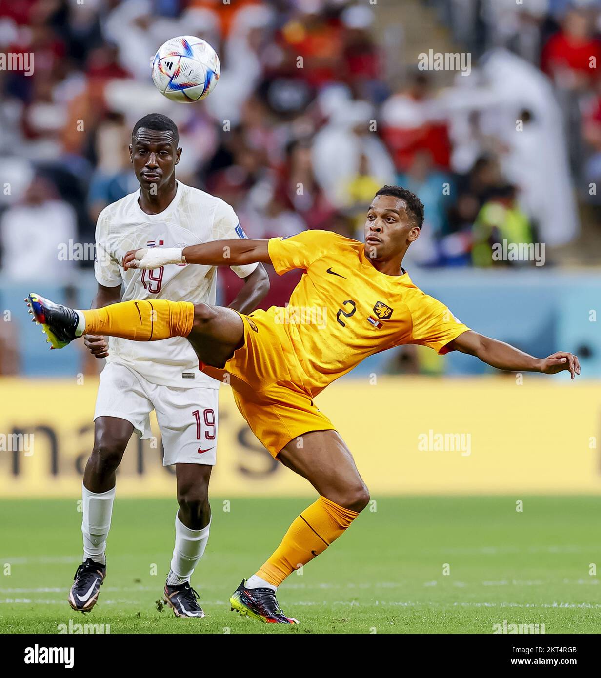 AL KHOR - Ali Almoez of Qatar and Jurrien Timber of Holland (LR) during ...