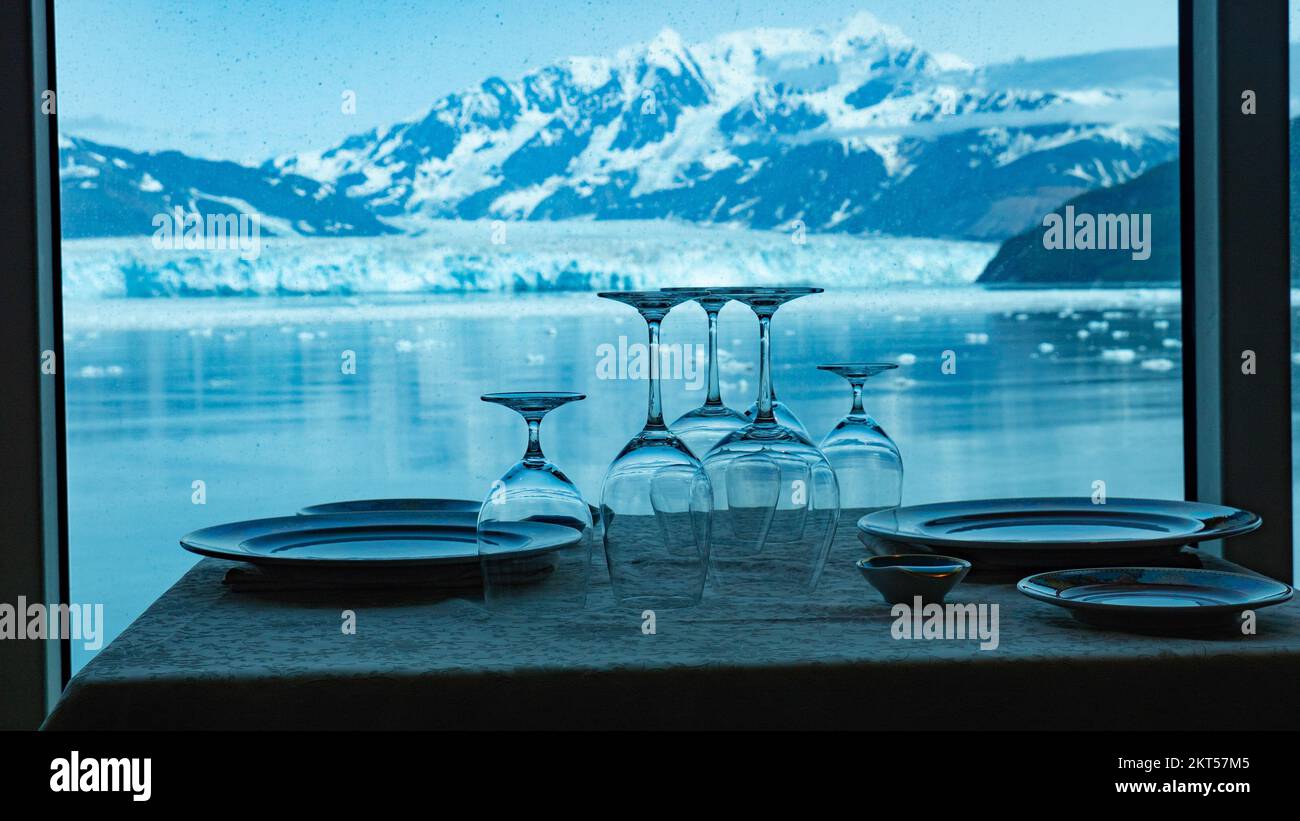 Restaurant interior with table set by panoramic window at scenic ...