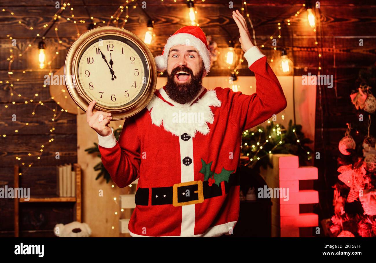Real feelings. man santa hat. new year midnight. time for christmas ...