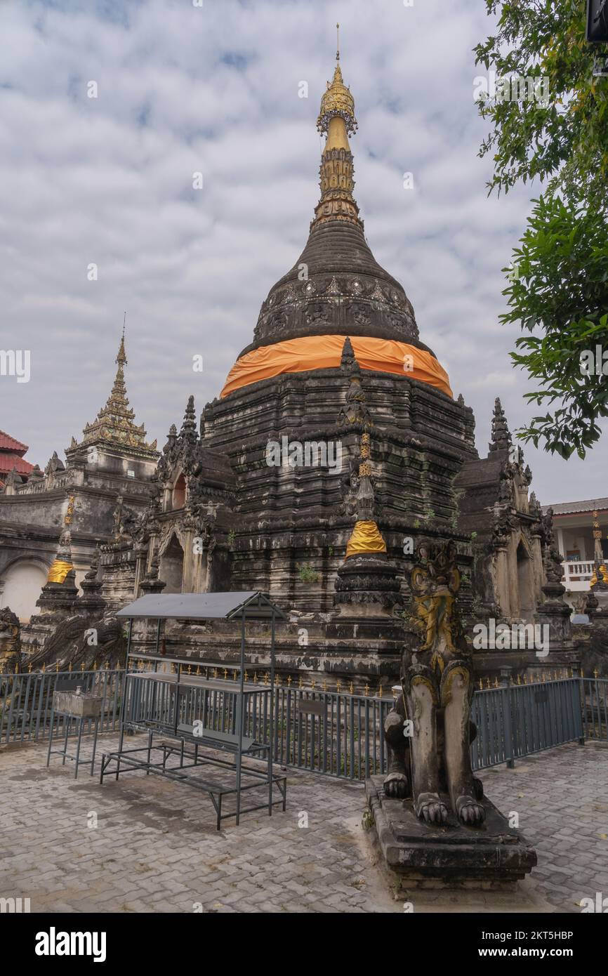 Landscape view of main stupa with singha or chinthe lion protector at ...