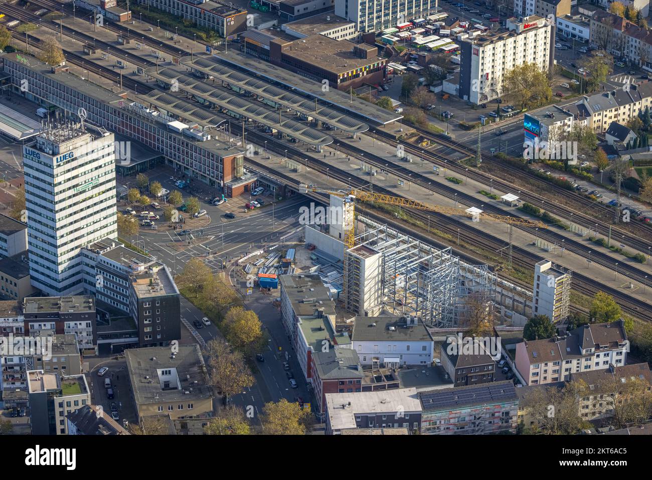 Aerial view, city with main station, Lueg high-rise, construction site and new building parking ...