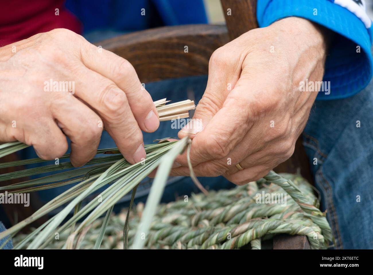 Italy, Lombardy, Chair-Mender bottoming a Chair With a Straw Stock ...
