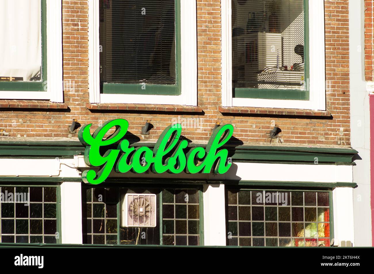 Utrecht, Netherlands - November 12, 2022: The green Grolsch logo on the facade of a pub Stock ...