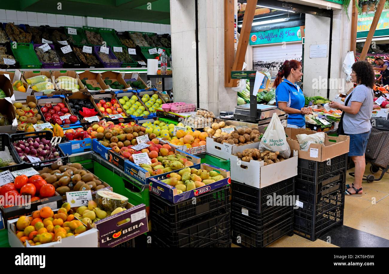 Inside the Mercado del Puerto, the harbourside market with fruit and ...