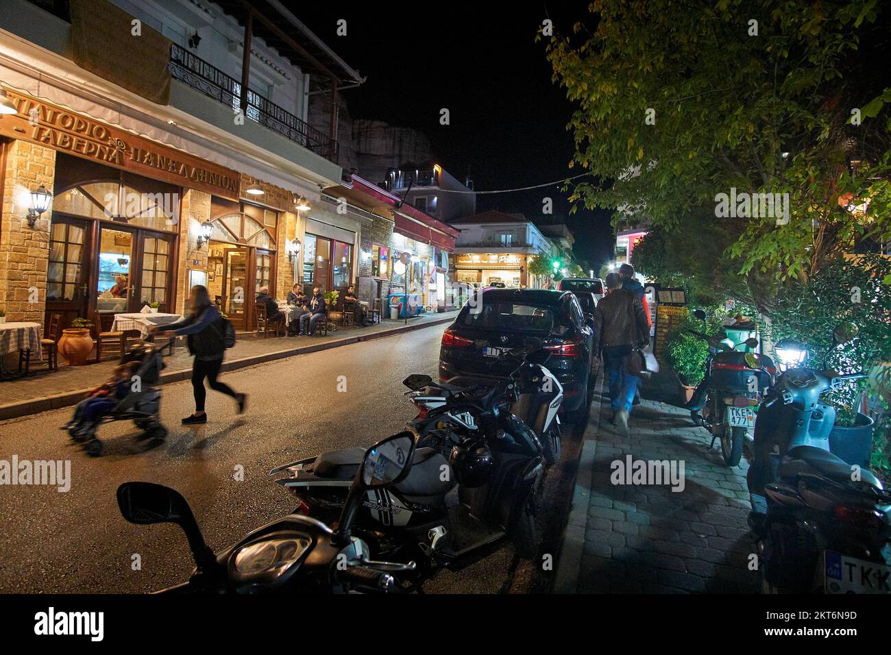 Nightlife and urban view from the center of Kalambaka city at night in ...