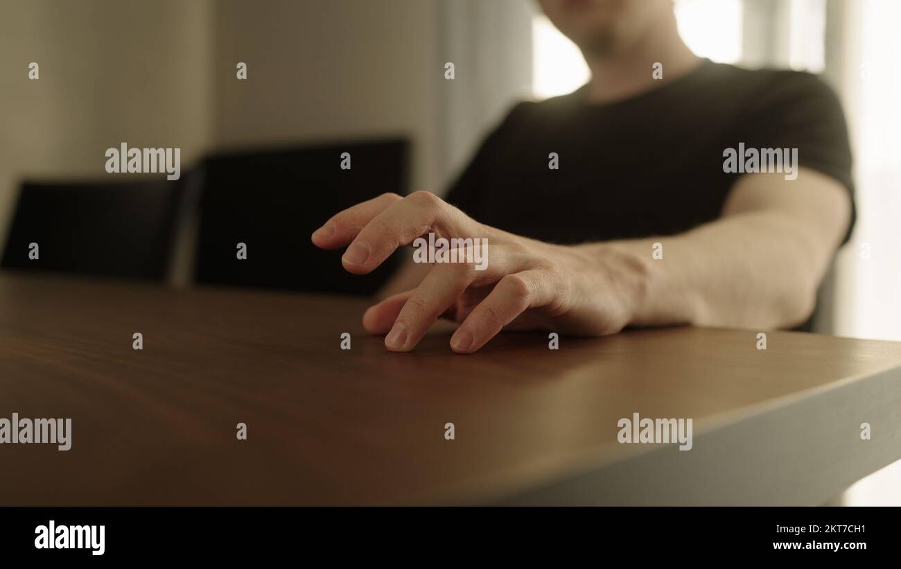 Nervous finger tap hi-res stock photography and images - Alamy