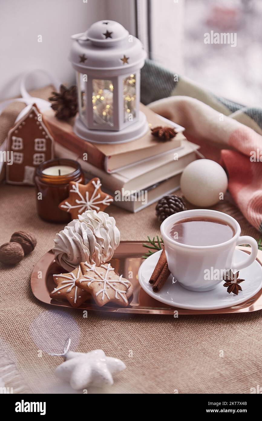 Cozy winter atmosphere at windowsill. Aesthetic Christmas window with ...