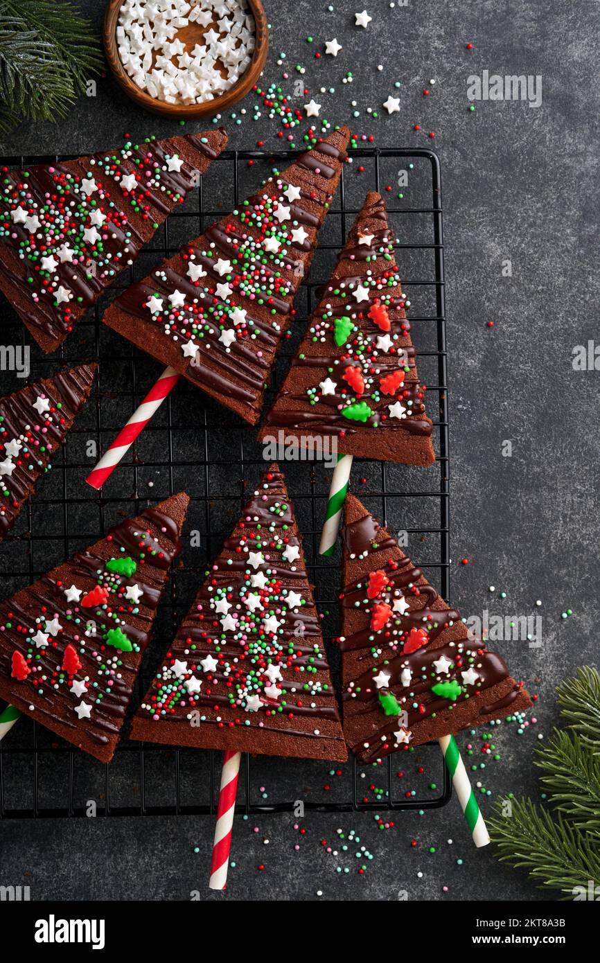Chocolate brownies Christmas tree with chocolate icing and festive ...